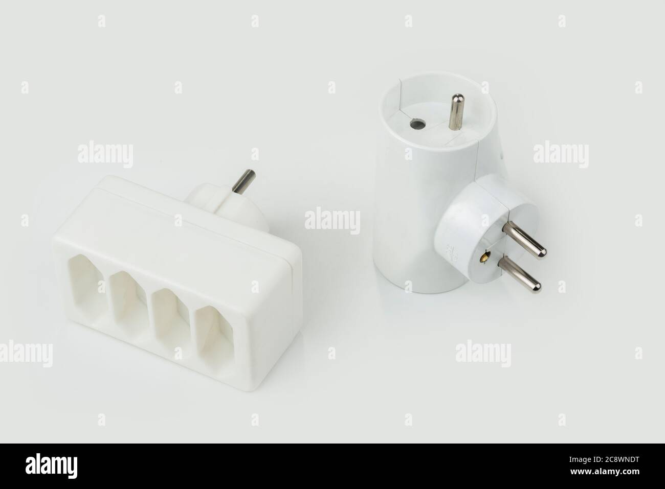 220V electric splitter on a white background Stock Photo - Alamy