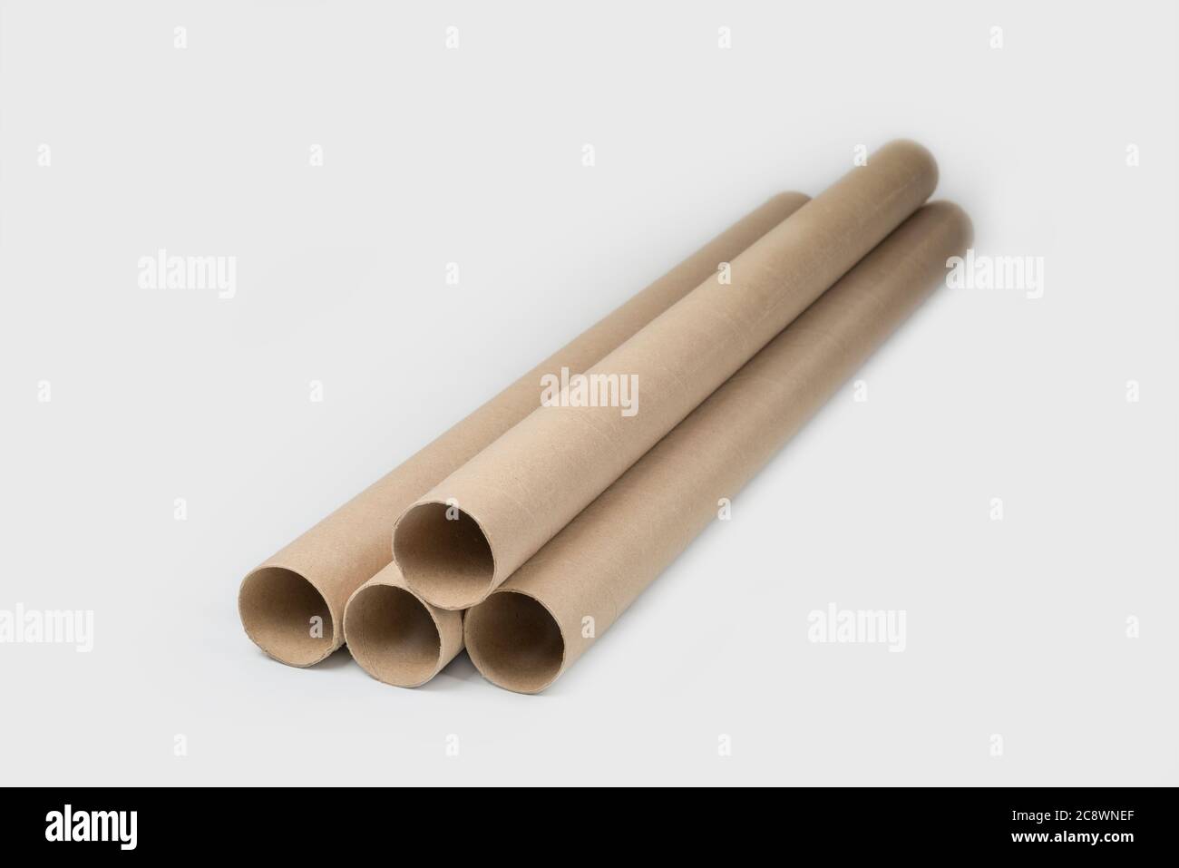Long paper rolls on a white background. Conceptual and environmental ...