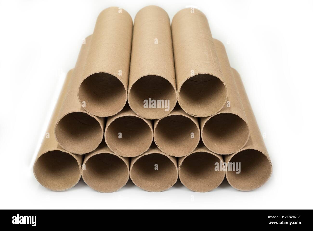 Long paper rolls on a white background. Conceptual and environmental ...