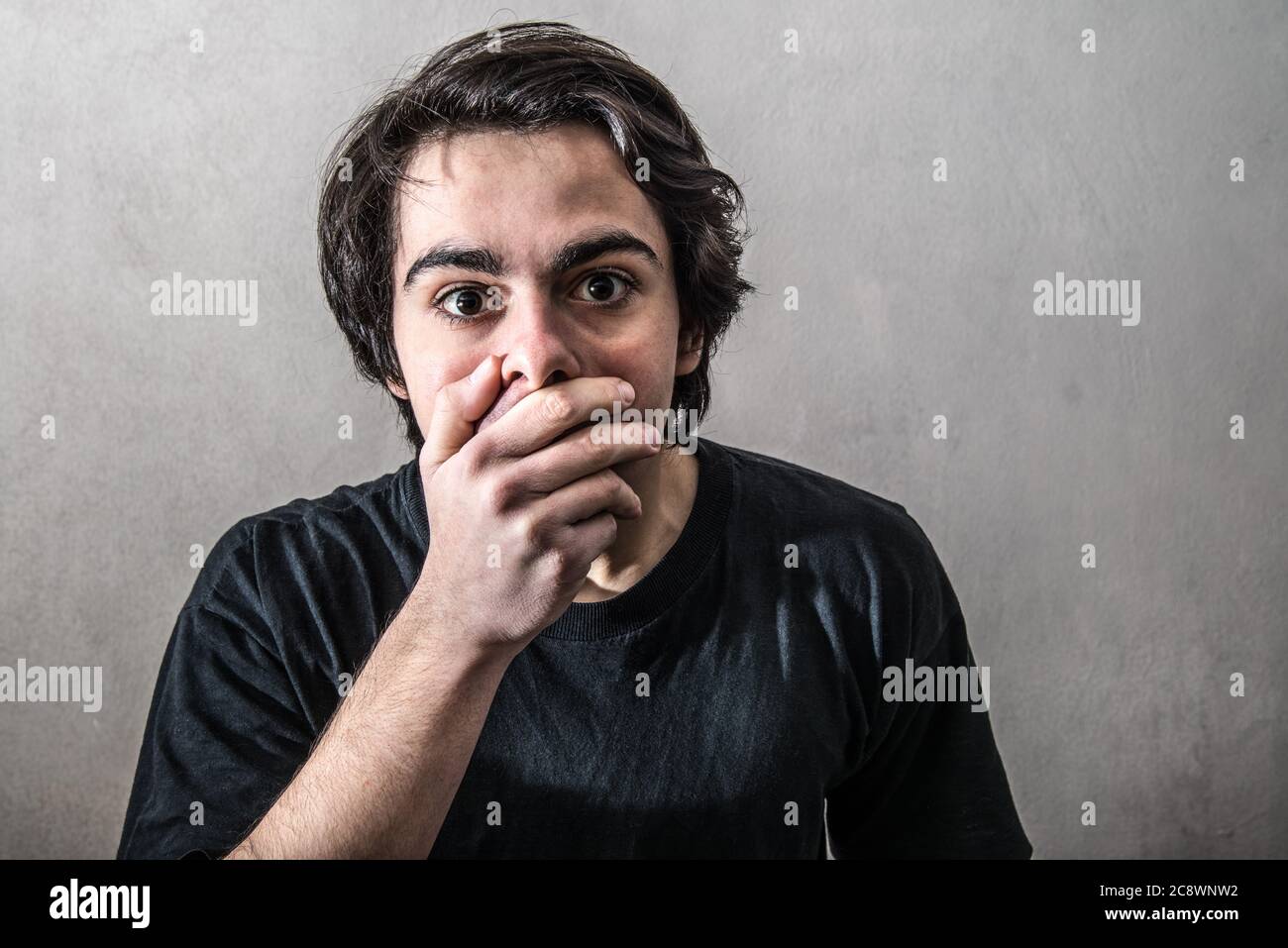 a Boy with an expression of amazement and disorientation Stock Photo ...