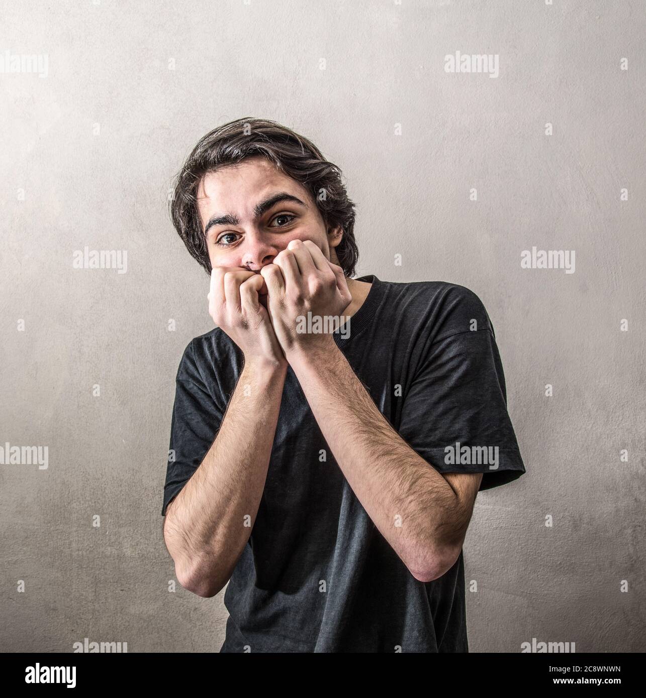a Boy with an expression of amazement and disorientation Stock Photo ...