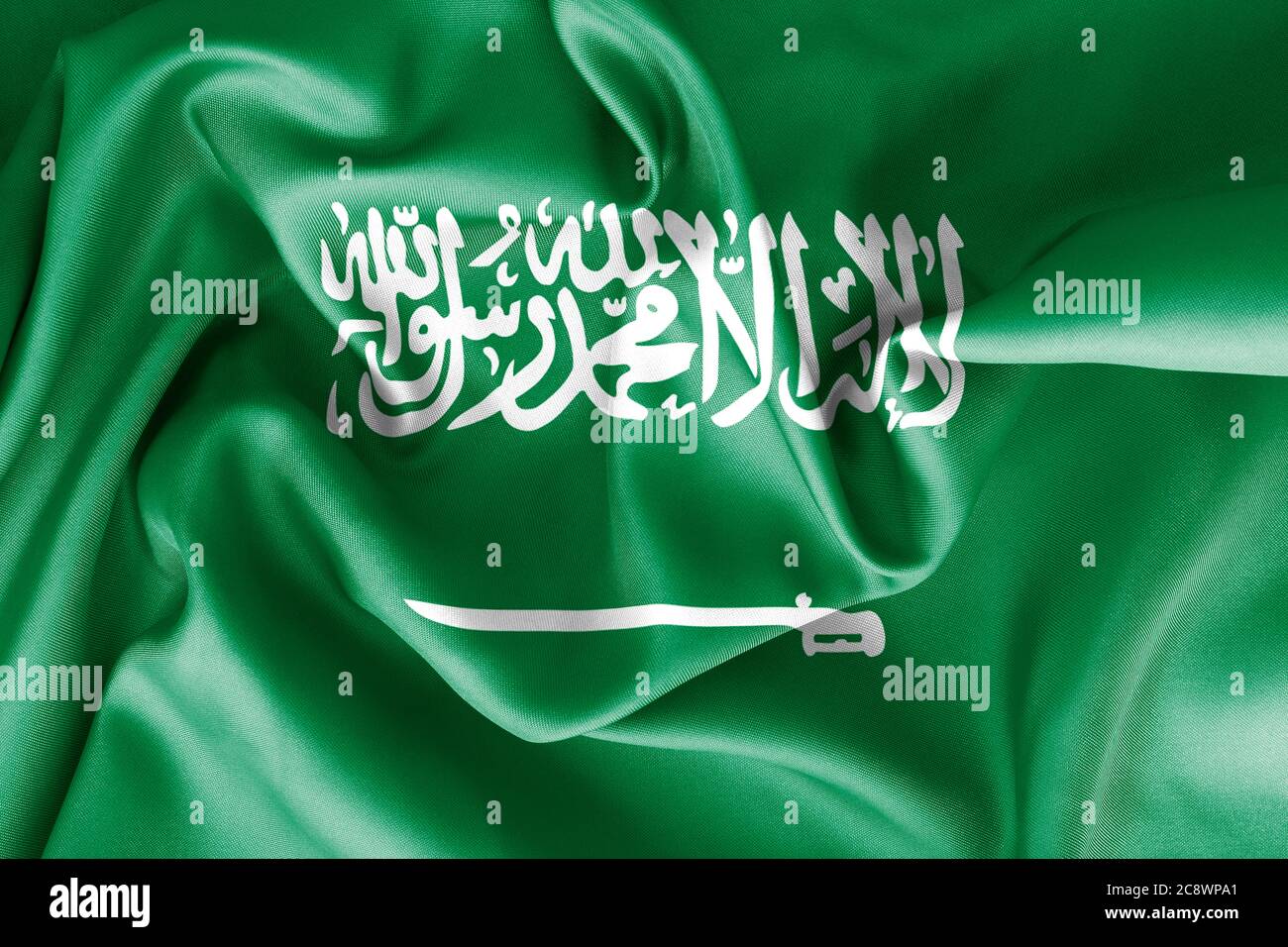 Saudi Arabia flag texture creased and crumpled up with light and ...