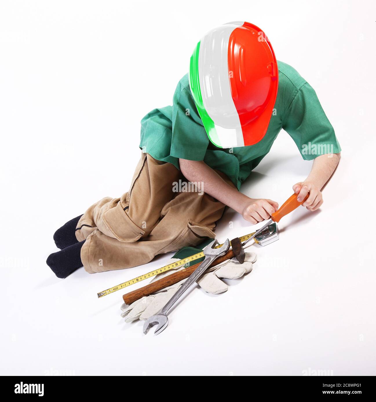 Young italian worker playing with tools for work Stock Photo - Alamy