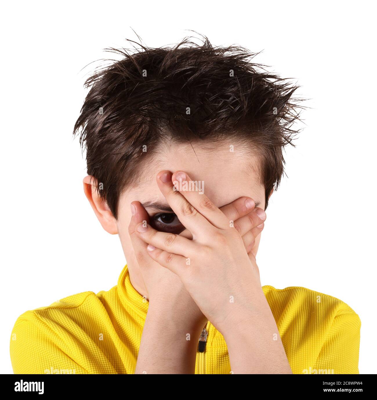 Little boy with frightened look in white background Stock Photo - Alamy