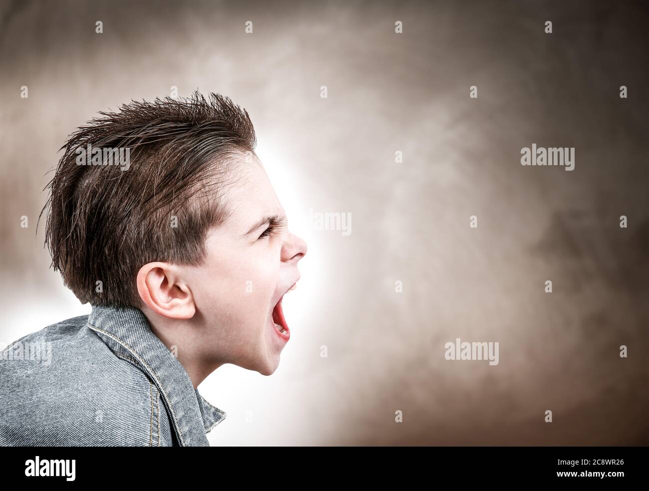 a young boy in anger Stock Photo - Alamy