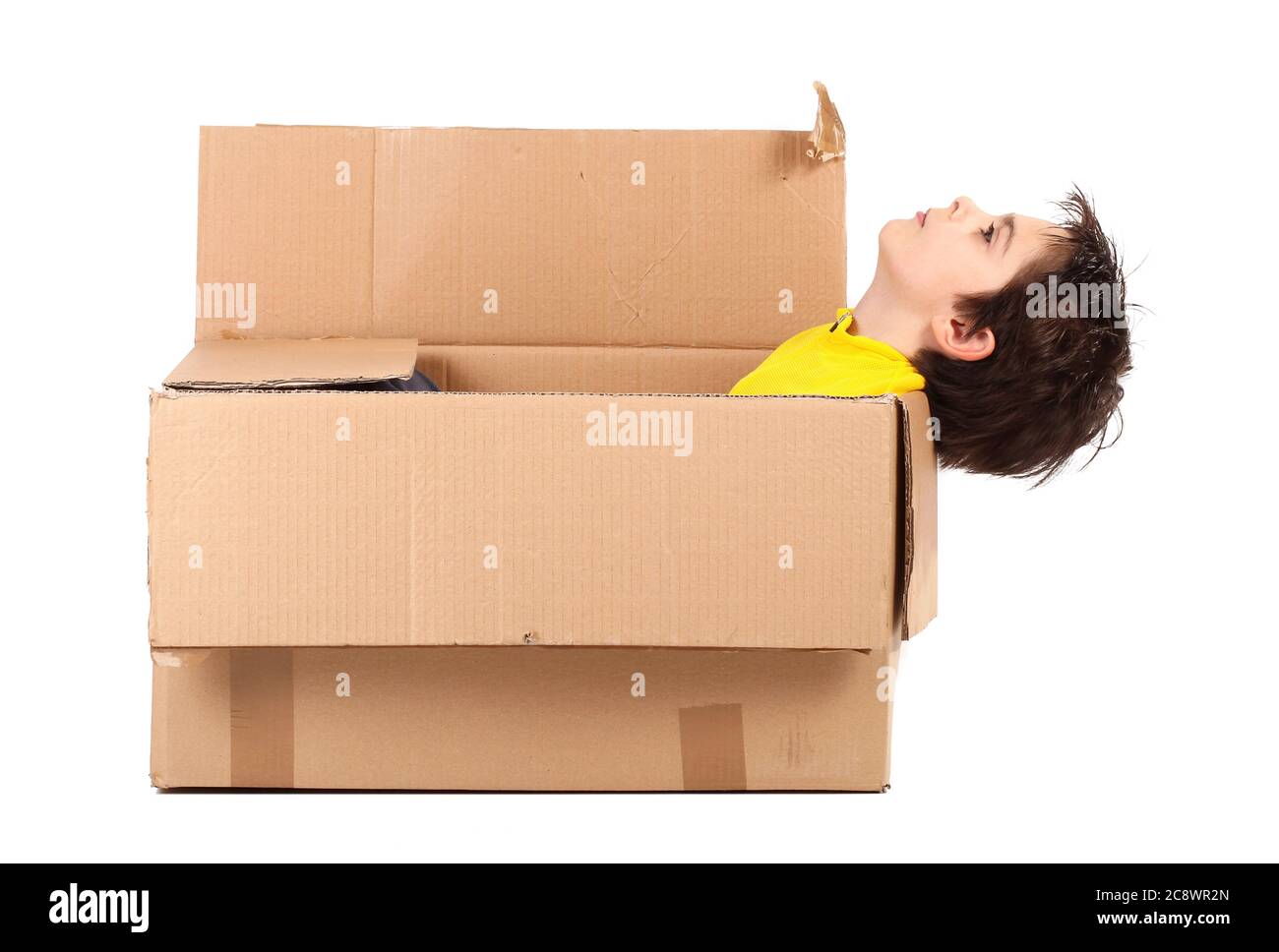 little boy and carton box on white background Stock Photo - Alamy