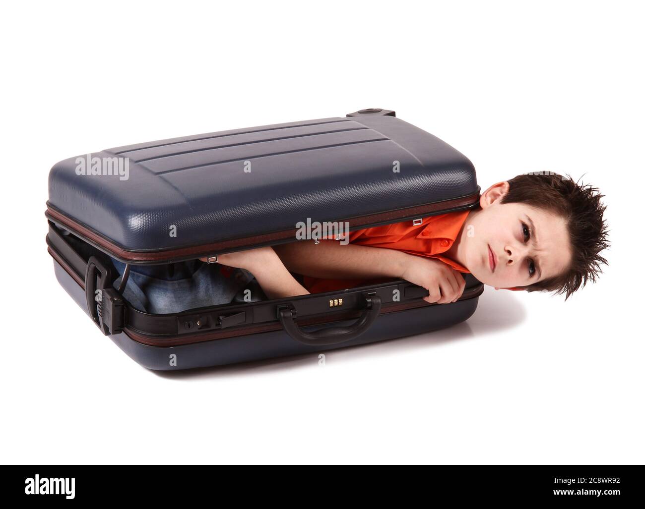 a boy locked in a suitcase Stock Photo - Alamy
