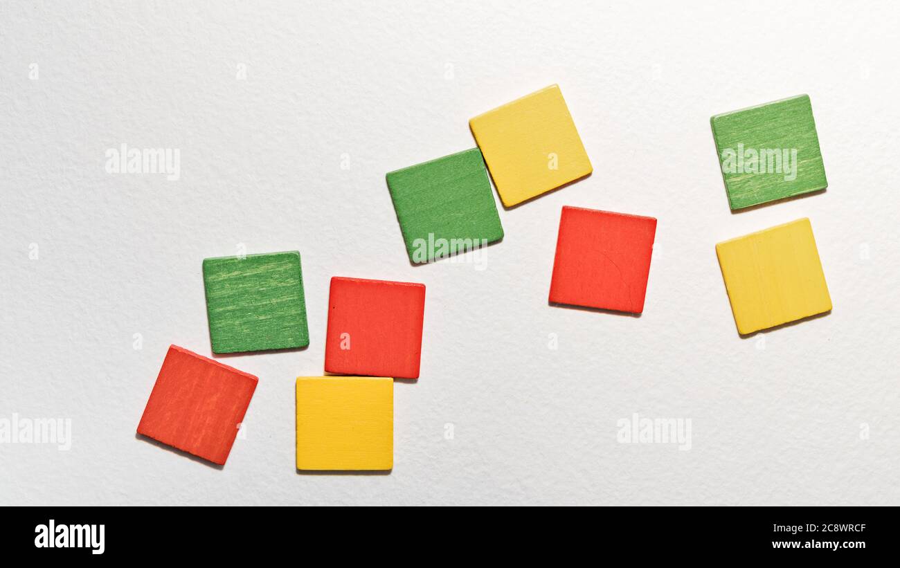 Different colorful squares wooden on white background. Geometric shapes ...