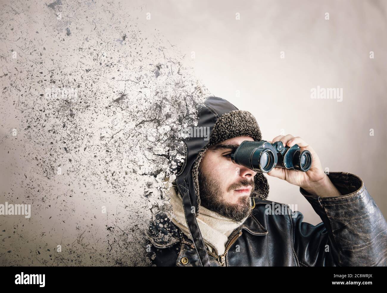 an airplane pilot looking through binoculars and dissolves Stock Photo ...