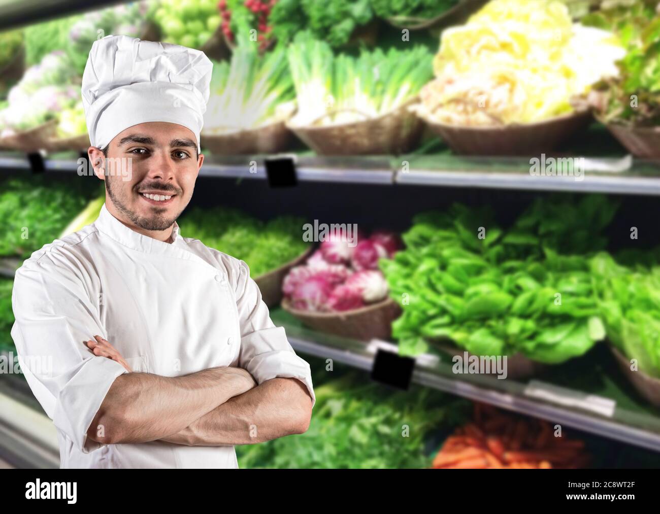 Young chef choose food at big supermarket Stock Photo - Alamy