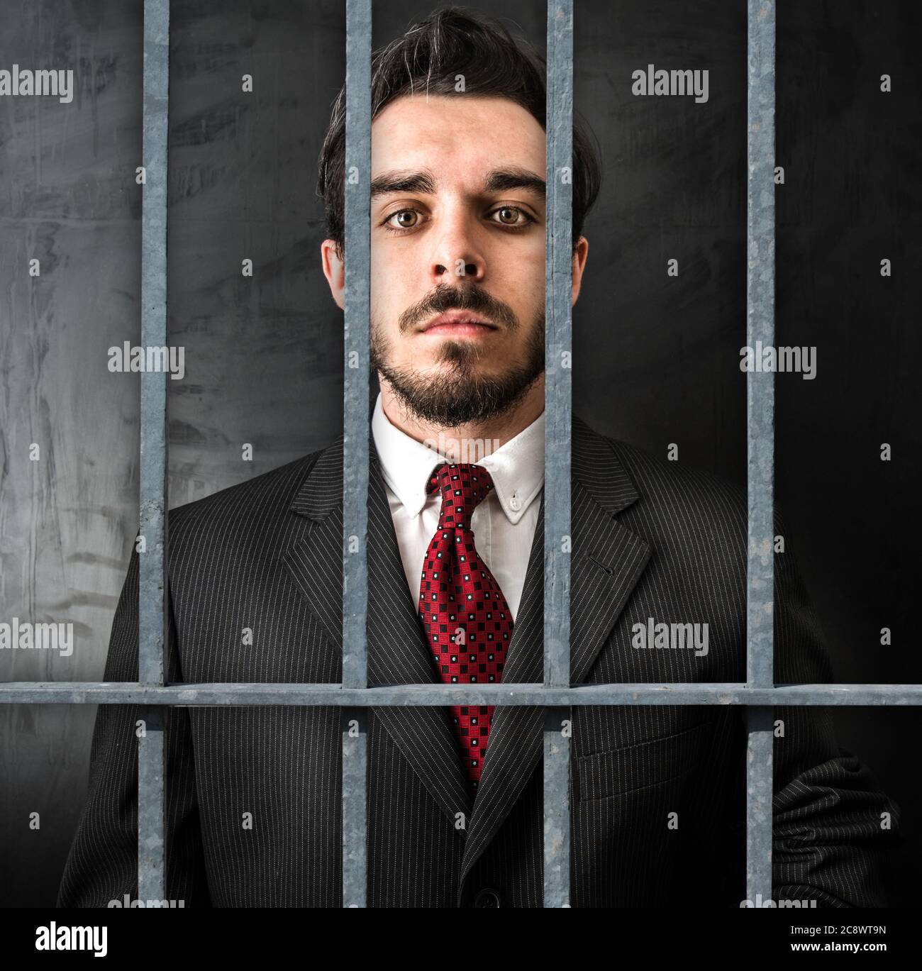 Man in jail cell hi-res stock photography and images - Alamy