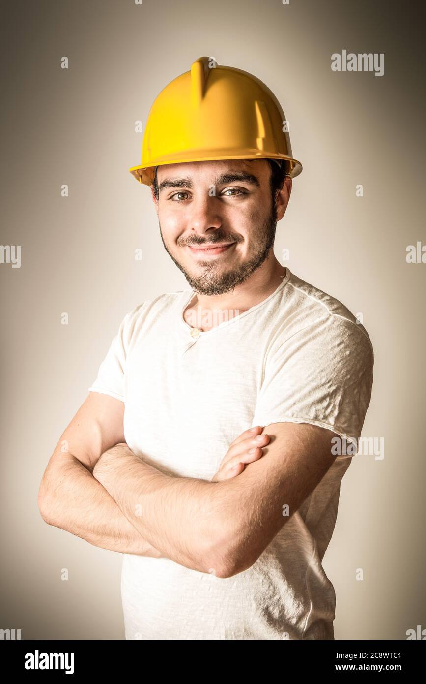 an young smiling worker Stock Photo - Alamy
