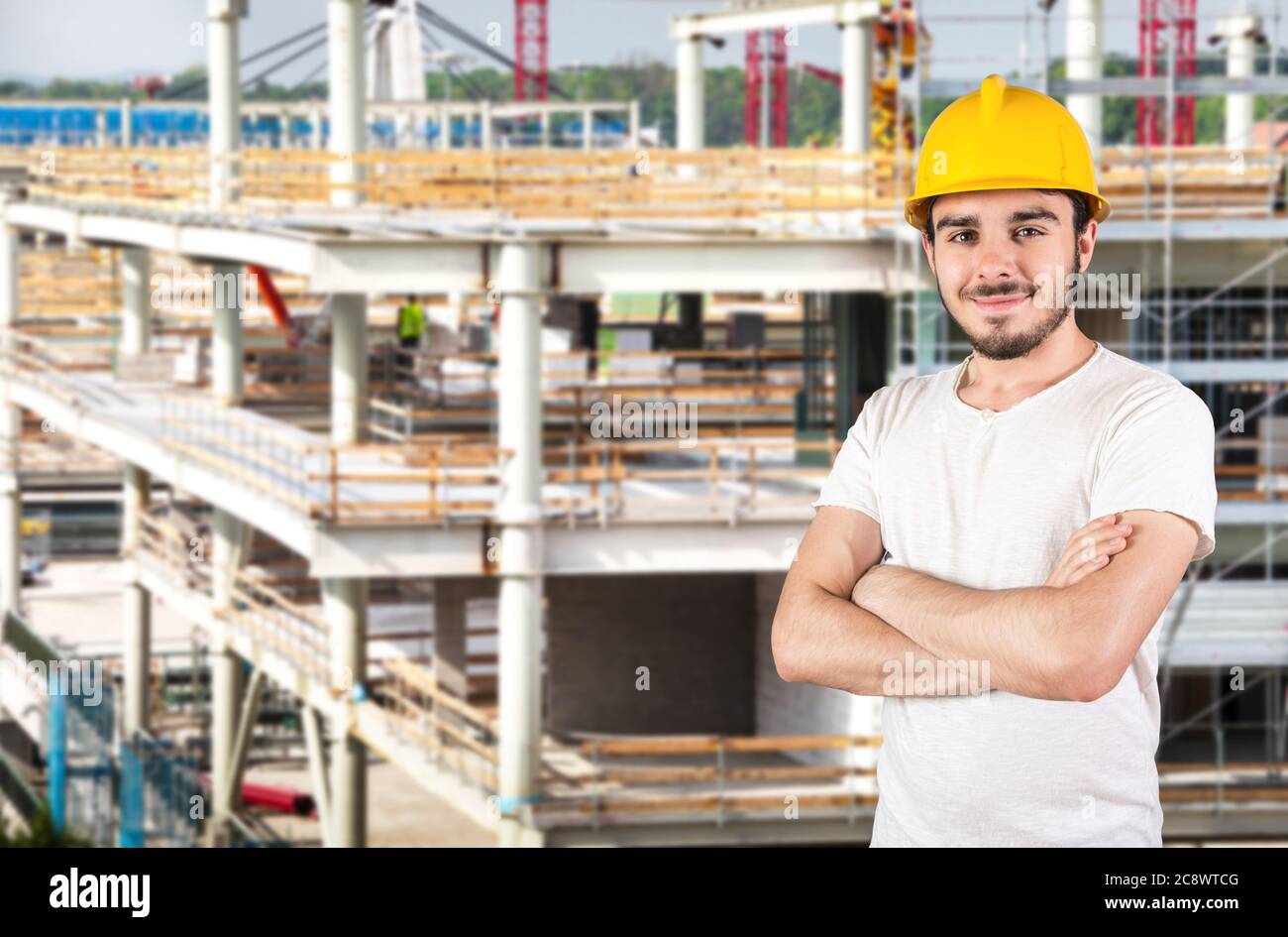 an young smiling worker Stock Photo - Alamy