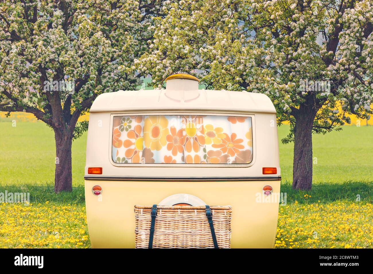 Yellow caravan yellow flowers hi-res stock photography and images - Alamy