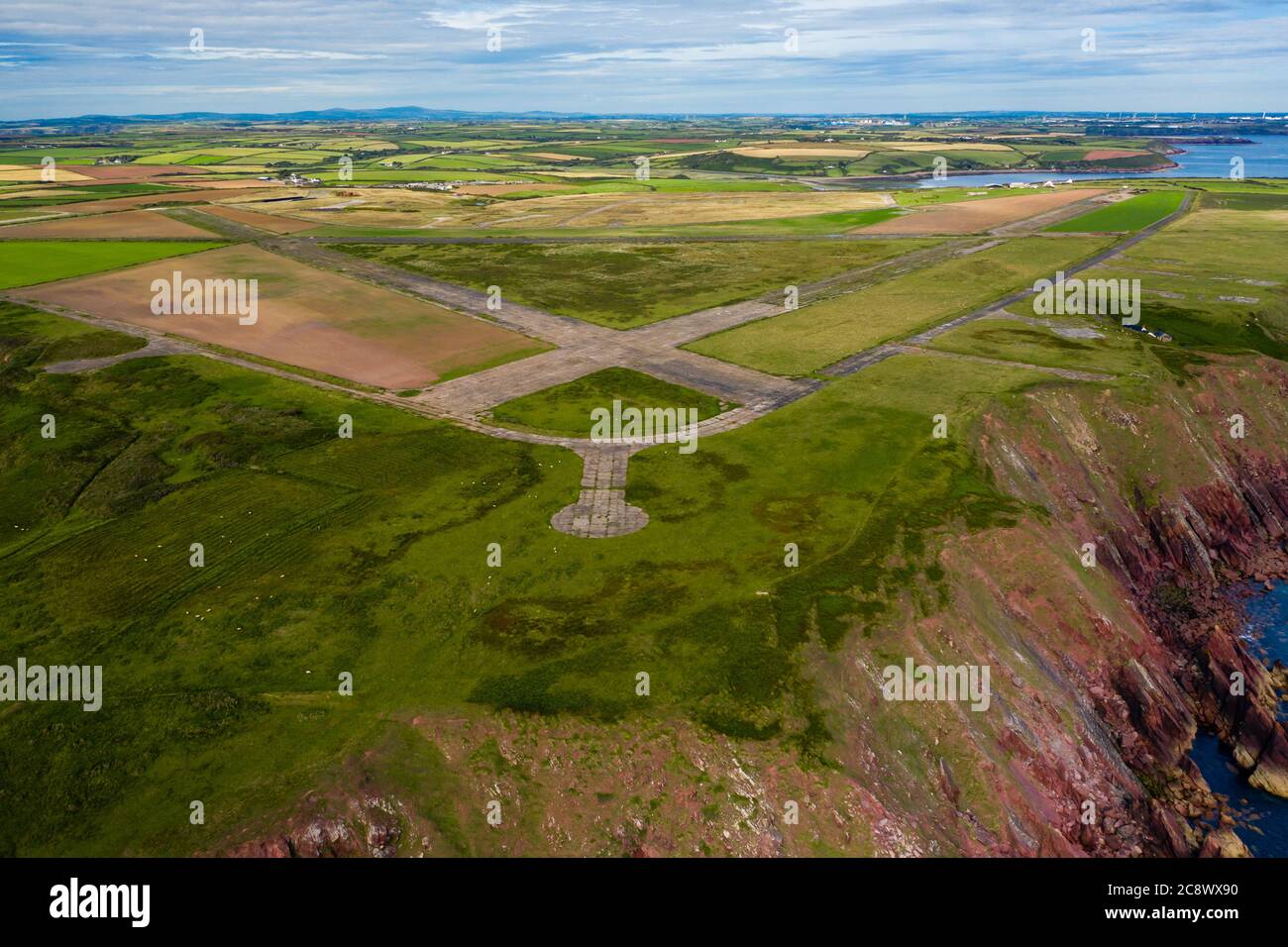 Aerial view of runways on a closed, overgrown WW2 airfield Stock Photo ...