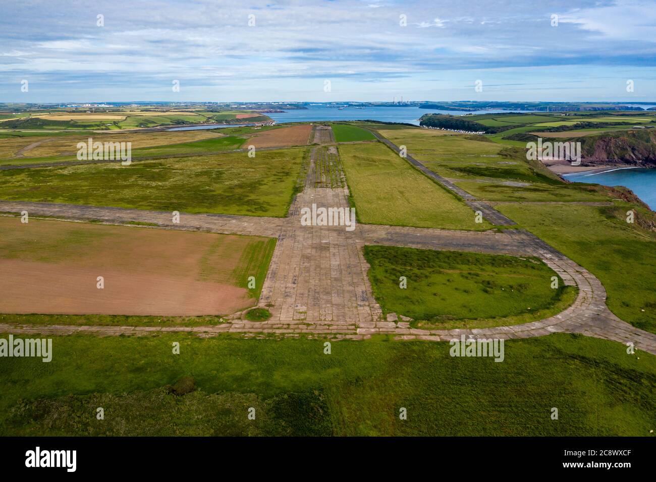 Aerial view of runways on a closed, overgrown WW2 airfield Stock Photo ...