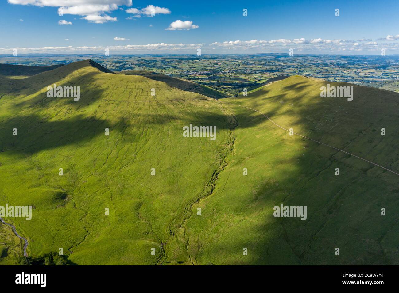 Aerial drone view of the tallest mountain peaks in the Brecon Beacons ...