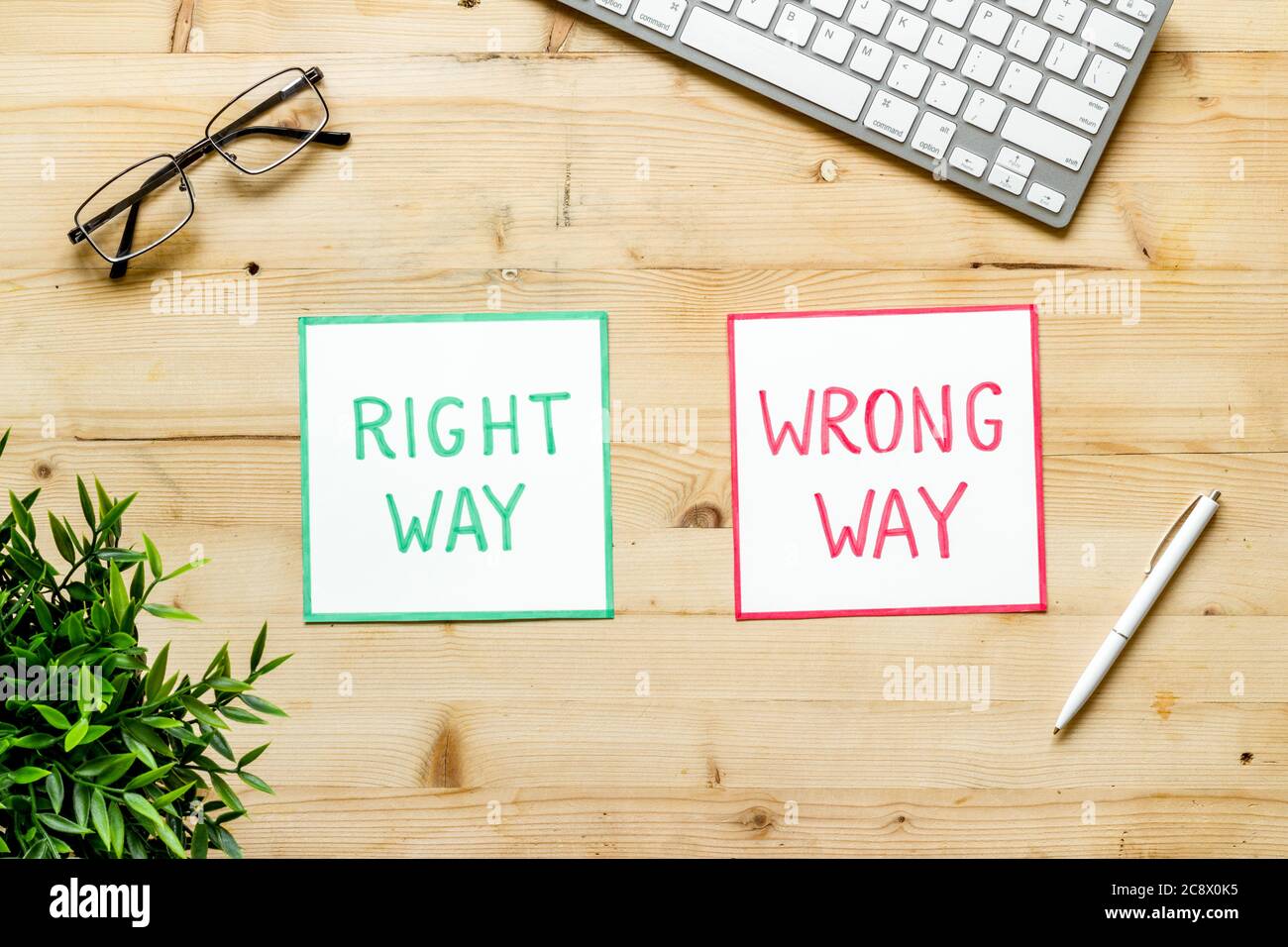 Doubt concept.. Right and wrong way icons on work desk from above Stock ...