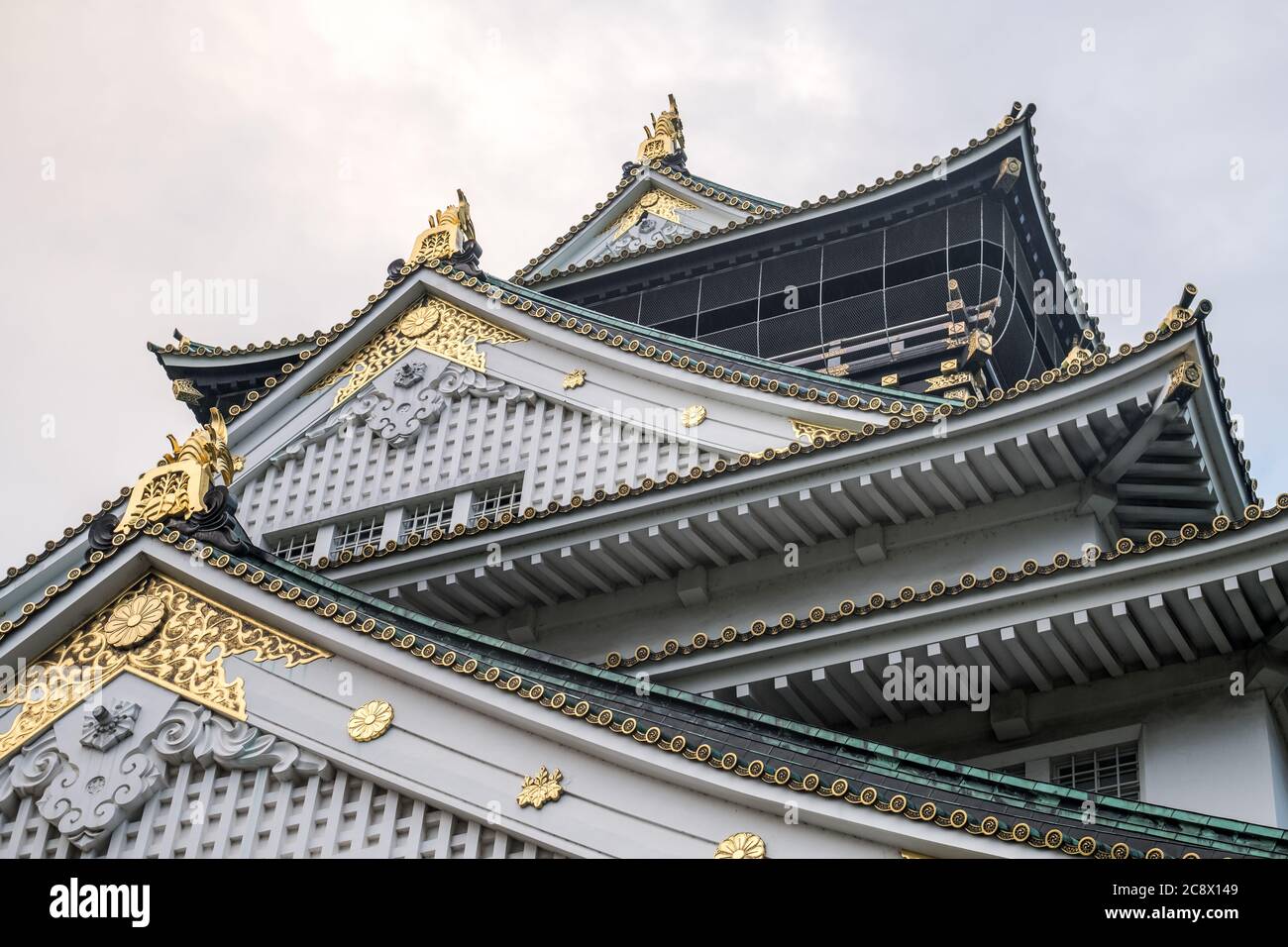 Grey temple with gold detailing, in Japan Stock Photo - Alamy