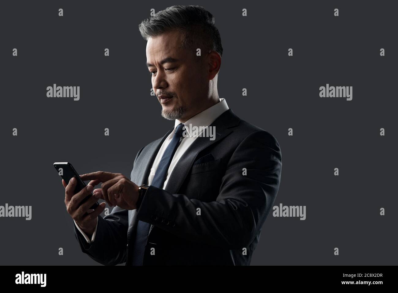 The use of mobile phones business man Stock Photo - Alamy