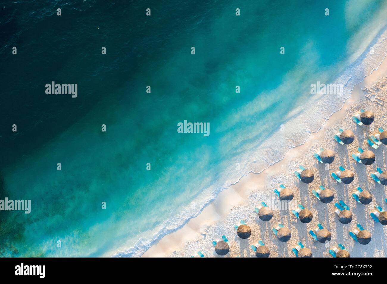 Aerial view of Marble beach. The most beautiful white beach in Greece ...