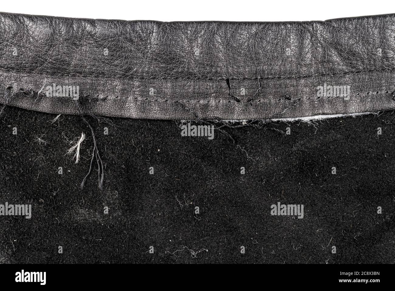 Piece of messy black leather isolated on white background. Crumpled ...