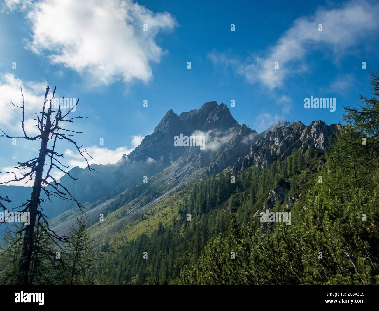 Climbing Rotwand via ferrata near Sexten in the Dolomites, South Tyrol ...