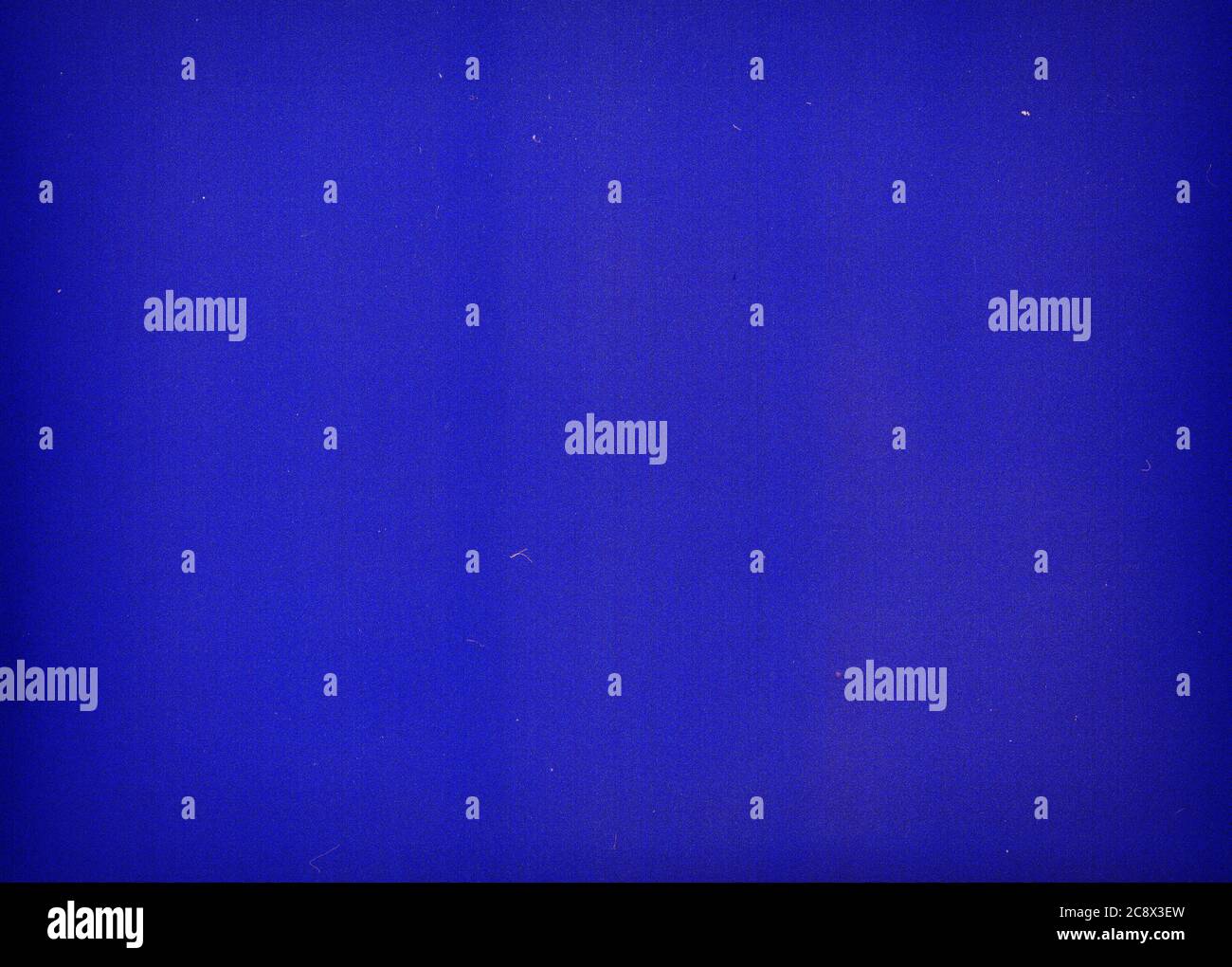 Noisy blue film frame with scratches, dust and grain. Abstract old film ...