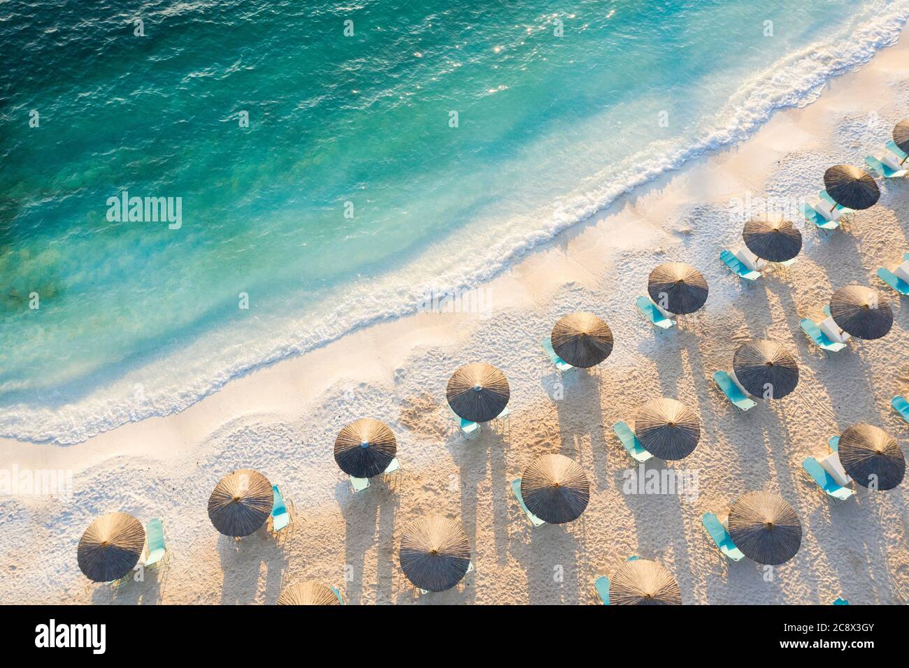 Aerial view of Marble beach. The most beautiful white beach in Greece ...