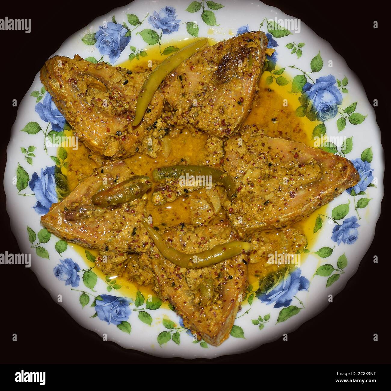 Bengali Food or dish Mustard Hilsa Top Angle Shot. It is also known as ...