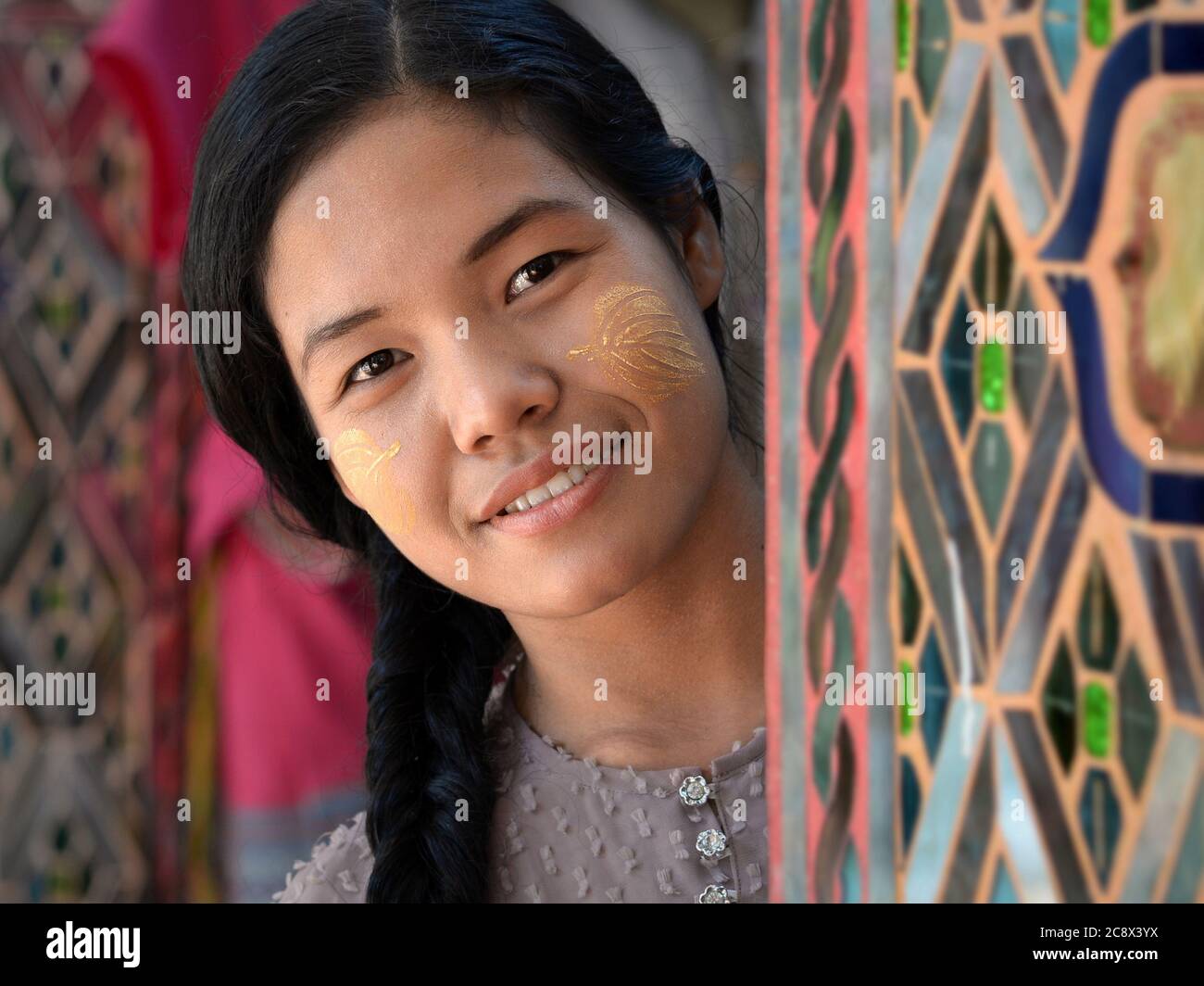 Burmese girl with thanaka paste on her cheeks hi-res stock photography and images - Alamy