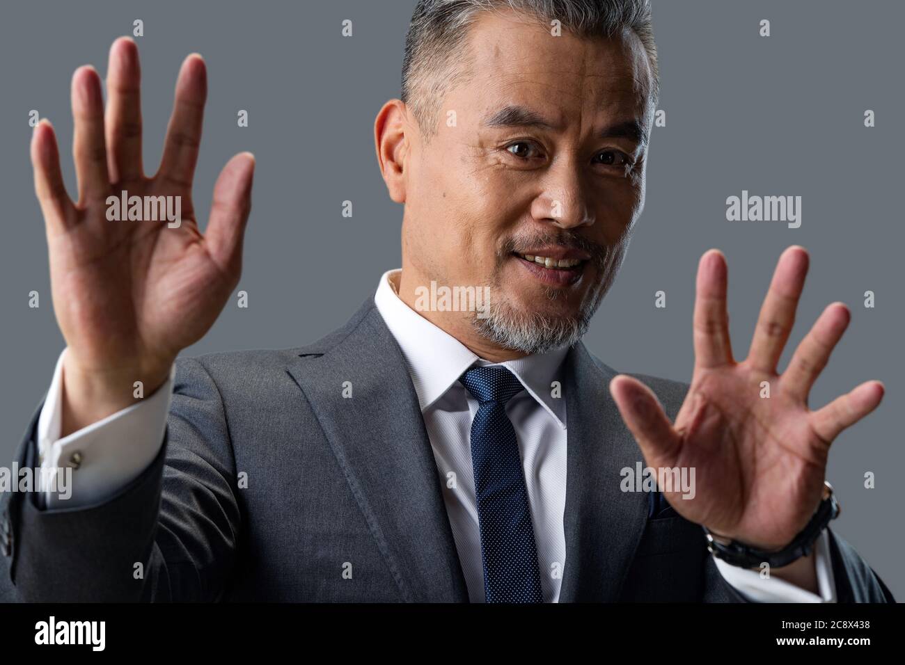 Business man stretched out his hand Stock Photo - Alamy