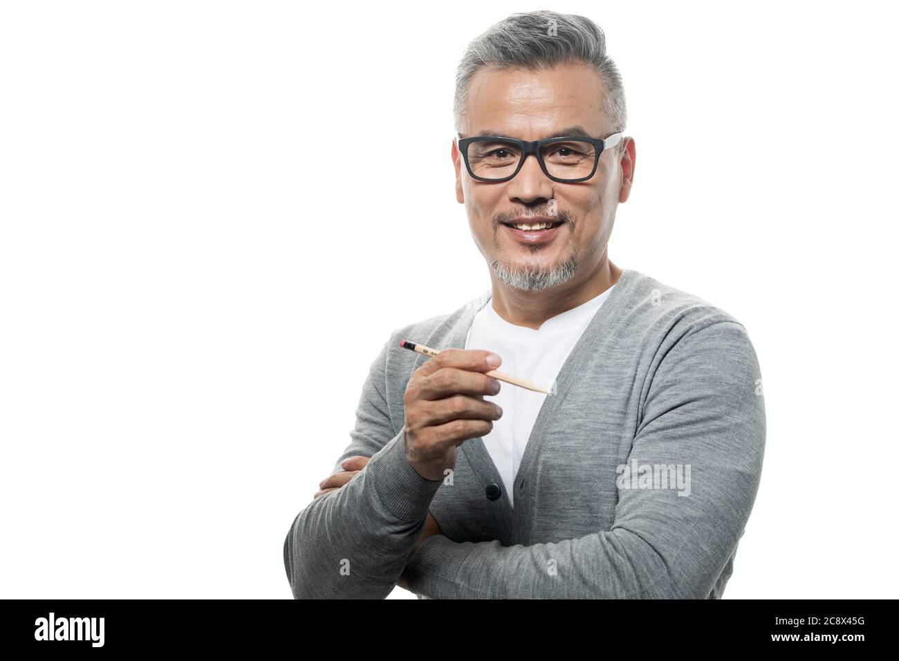 With a pencil, a senior designer Stock Photo - Alamy