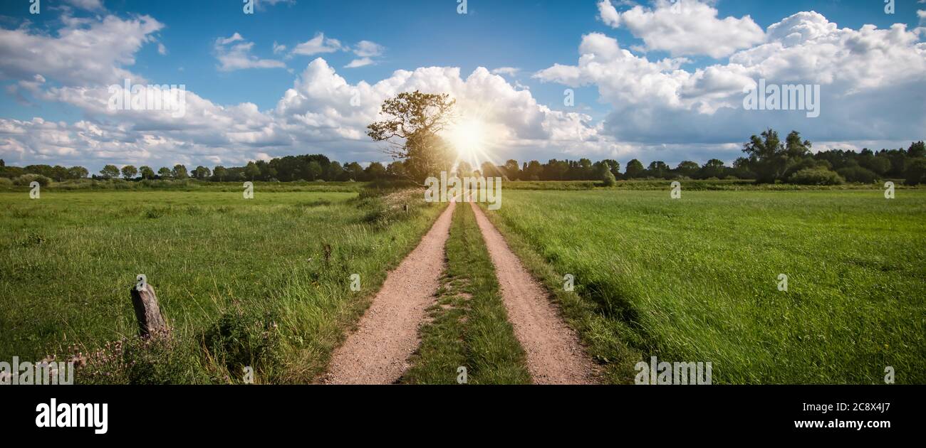 Panoramic view with a country road through the beautiful natural ...