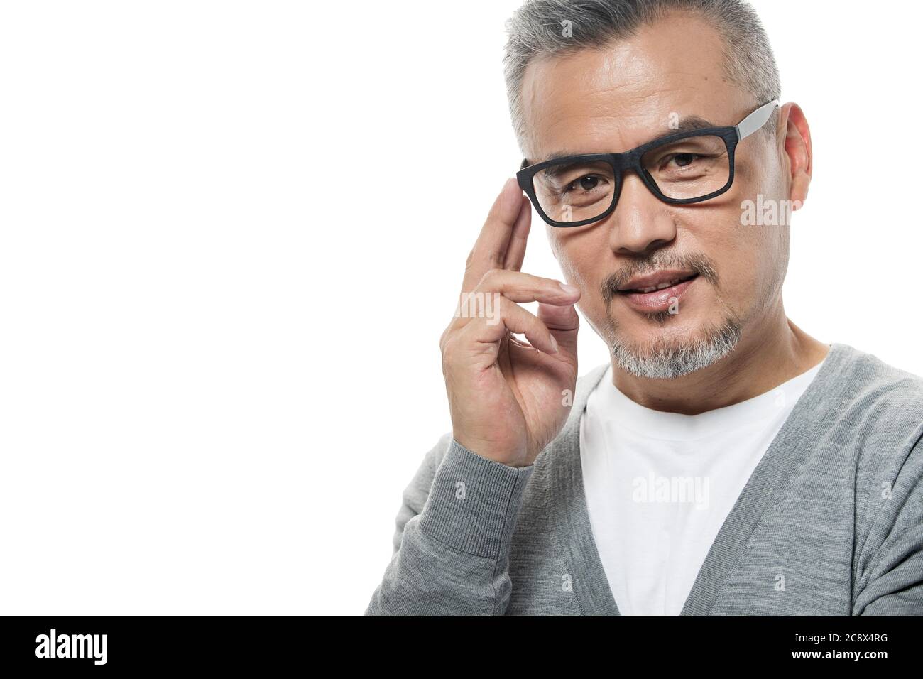 Touch glasses in middle-aged men Stock Photo - Alamy