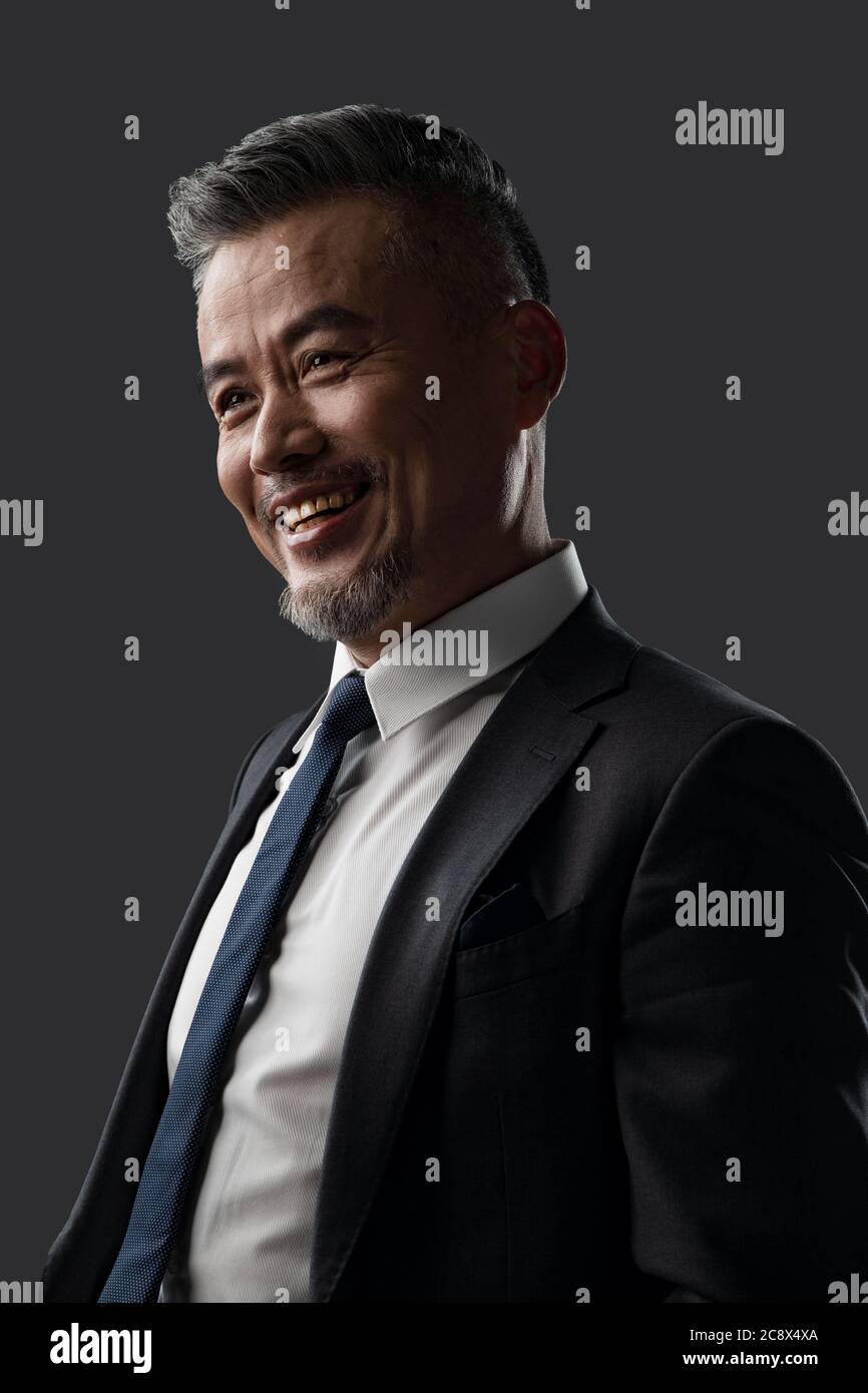 Successful business in middle-aged men Stock Photo - Alamy