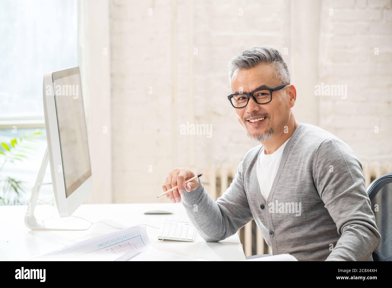 Senior designer office image Stock Photo - Alamy