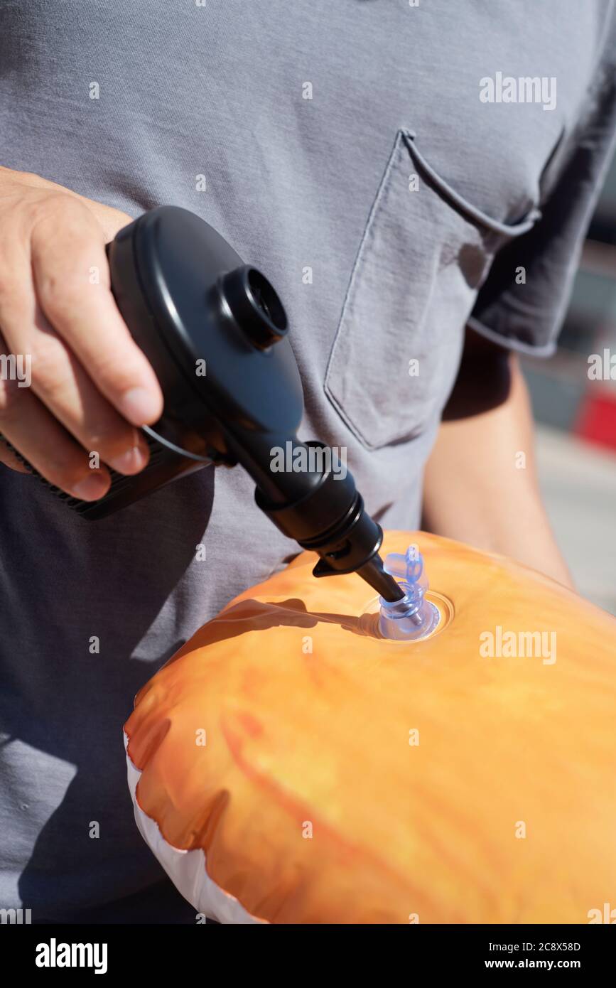 Inflating pool hi-res stock photography and images - Alamy
