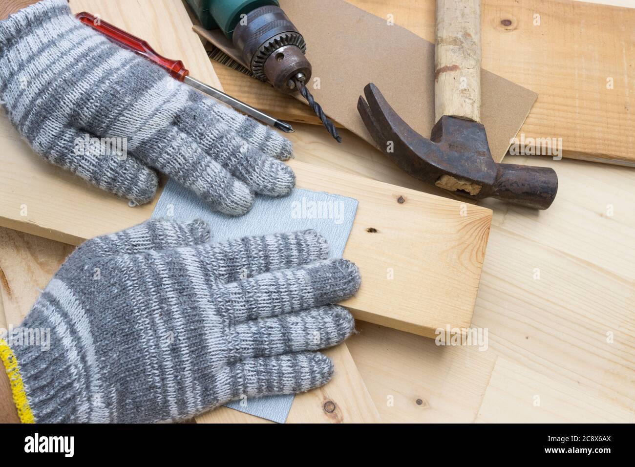 Worker Man Polishing Sandpaper Wood by hand Stock Photo - Alamy