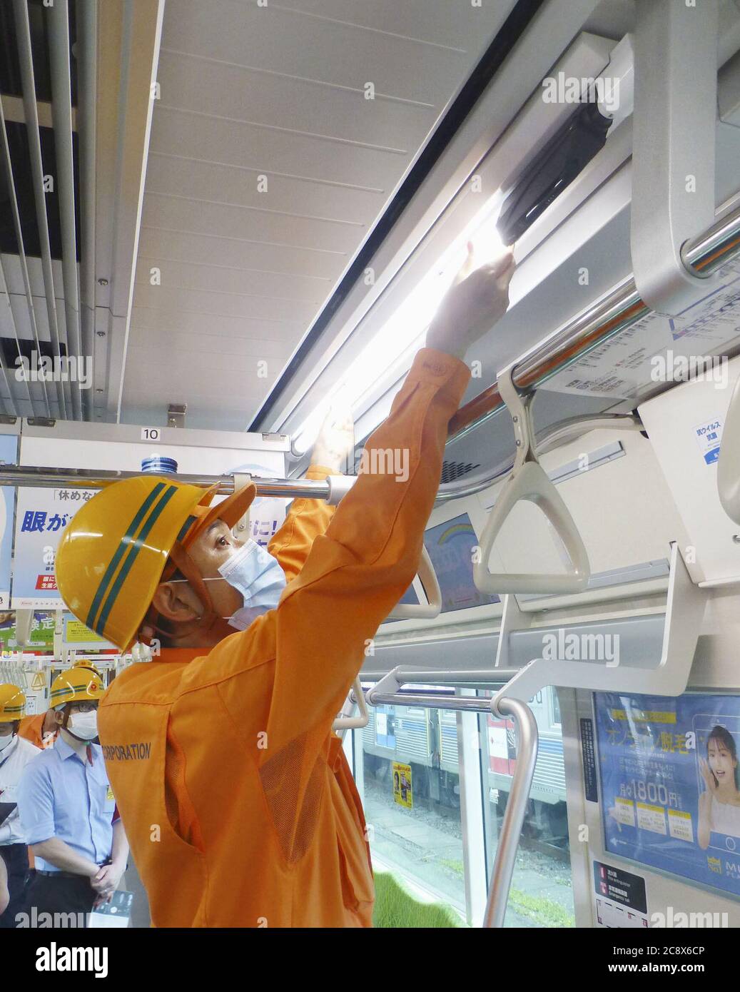 Photo taken inside a Tokyu railway train car in Yokohama, eastern Japan ...
