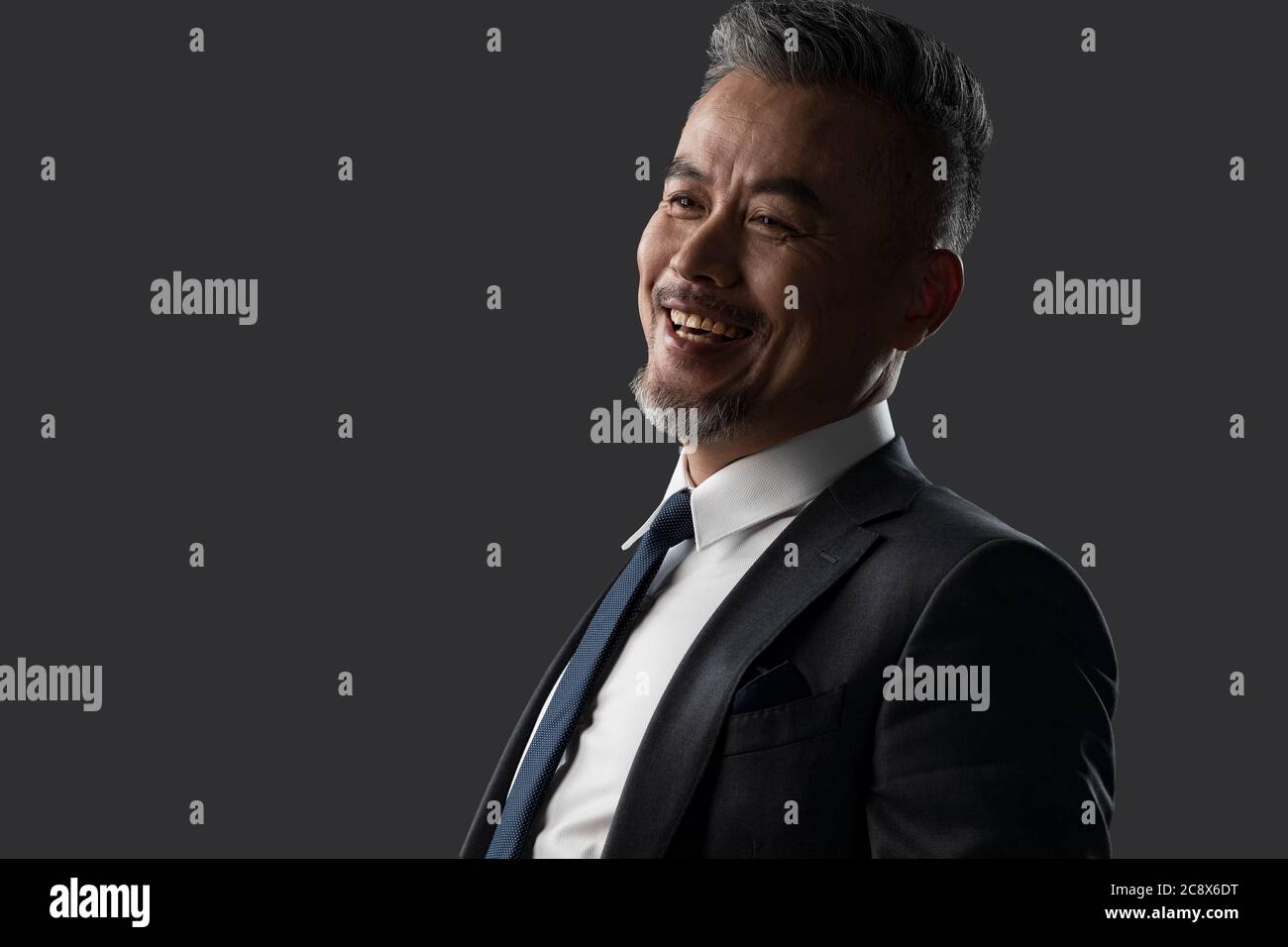 Laughing old business man Stock Photo - Alamy