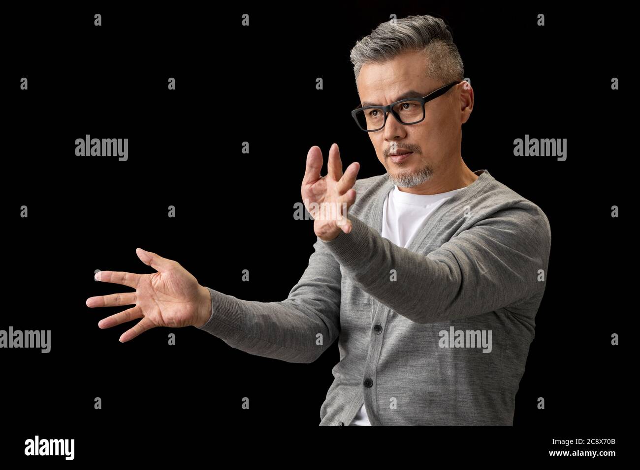 Well dressed man gestures hi-res stock photography and images - Alamy
