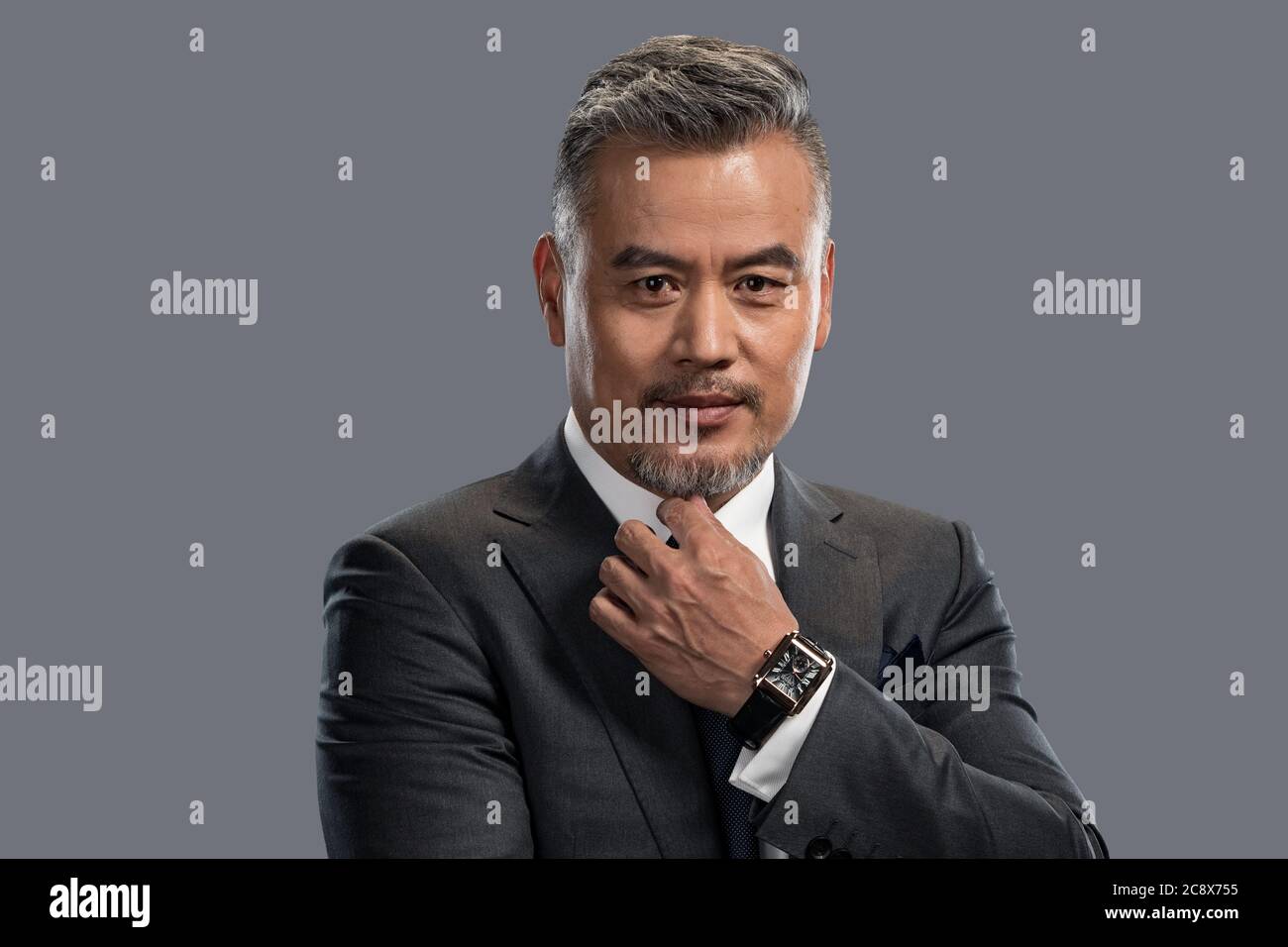 With your fingers touch the beard business man Stock Photo - Alamy