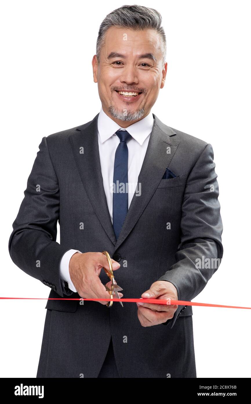 Ribbon cutting ceremony man scissors hi-res stock photography and ...