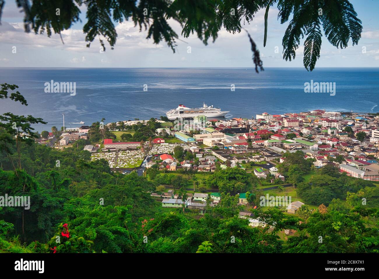 View over Roseau with cruise ship docked and showing buildings and ...