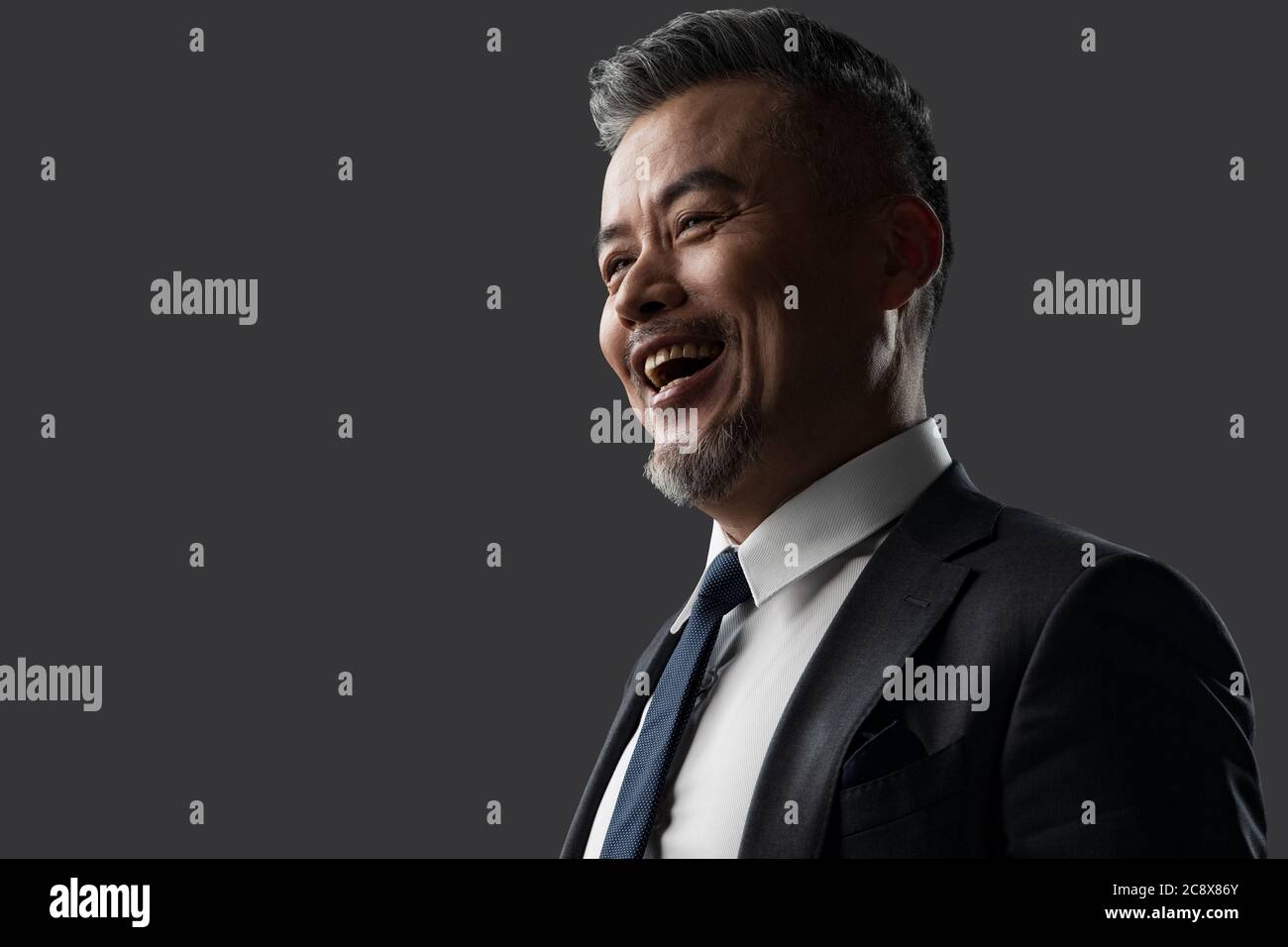 Laughing old business man Stock Photo - Alamy