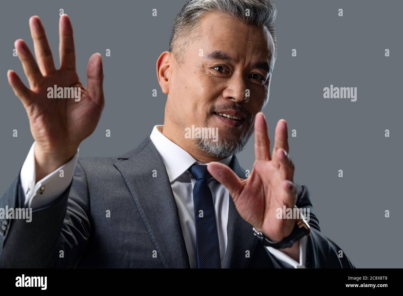 Business man stretched out his hand Stock Photo - Alamy