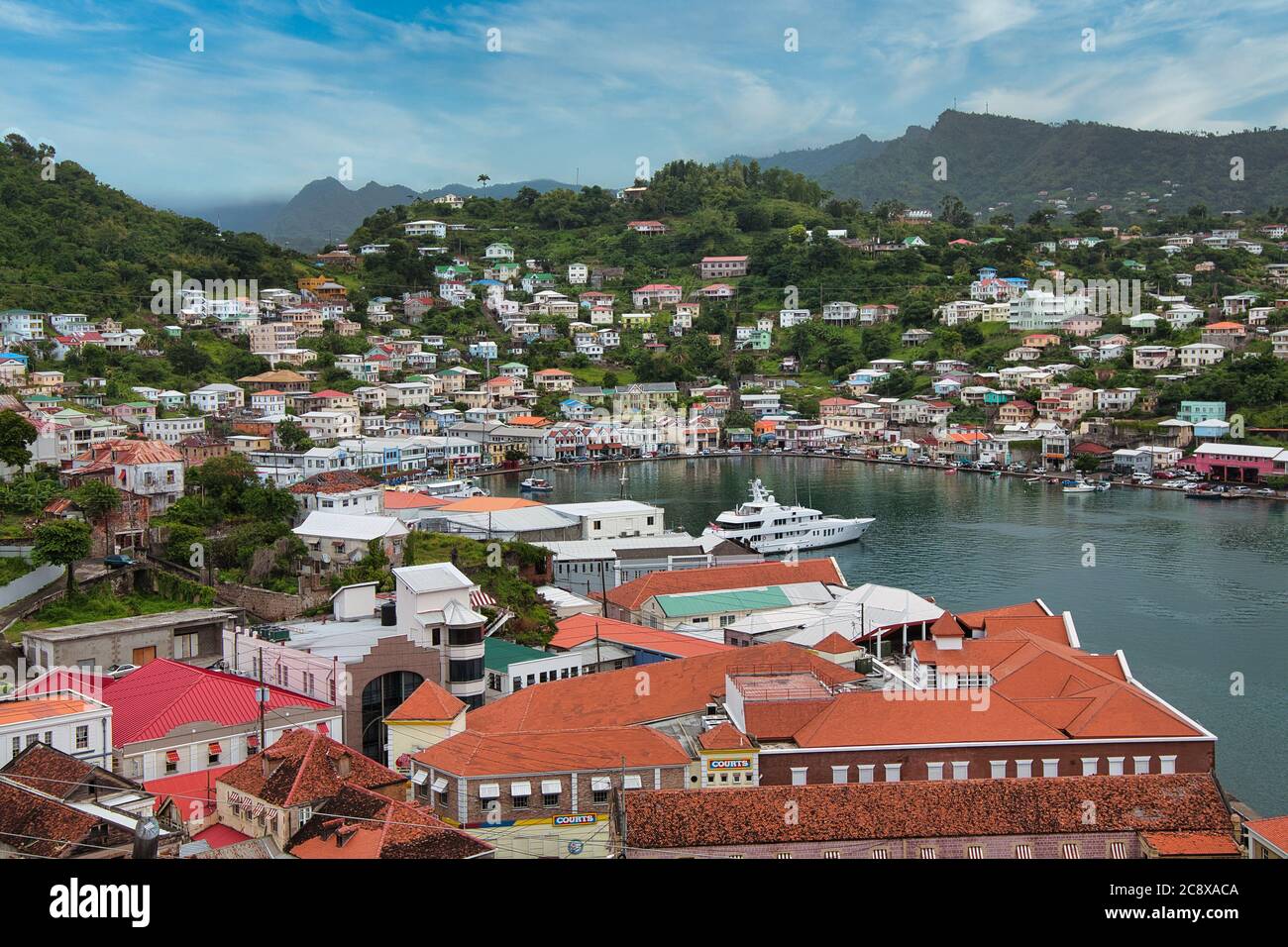 Overlooking the harbour and waterfront of St George's with luxury yacht ...