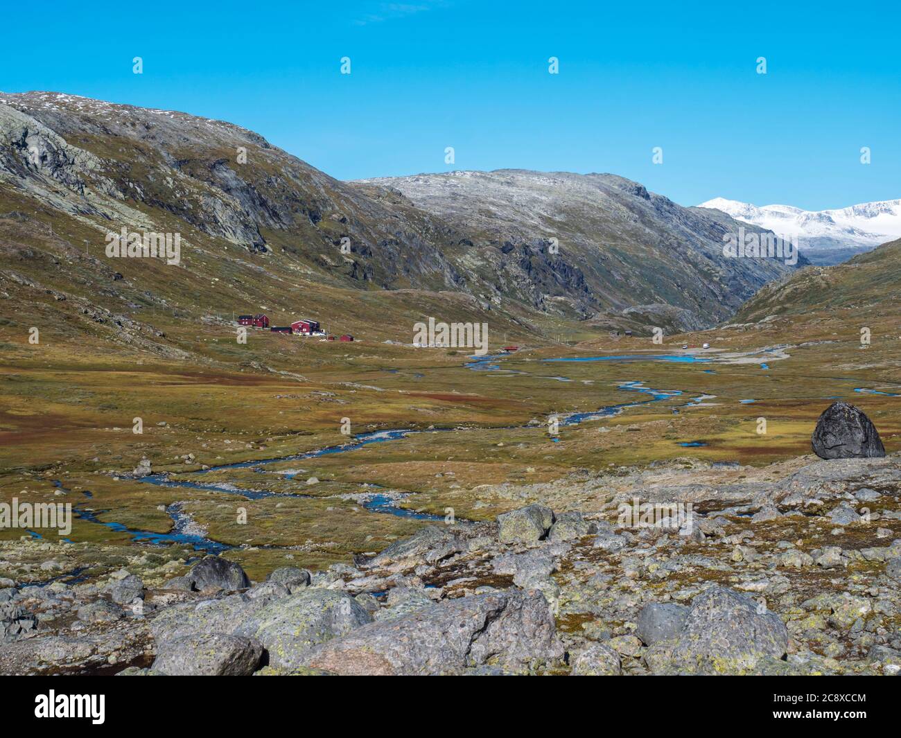 Autumn view on red Krossbu tourist station mountain hut buildings from ...