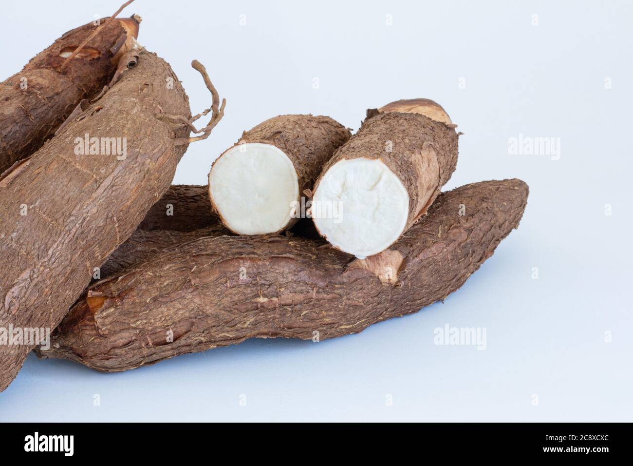 Fresh Cassava root isolated on a white background. Space copy Stock ...
